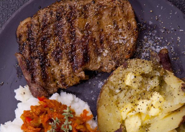 Cajun Spiced Rib-Eye steak with Chakalaka and Pap - Demand Africa